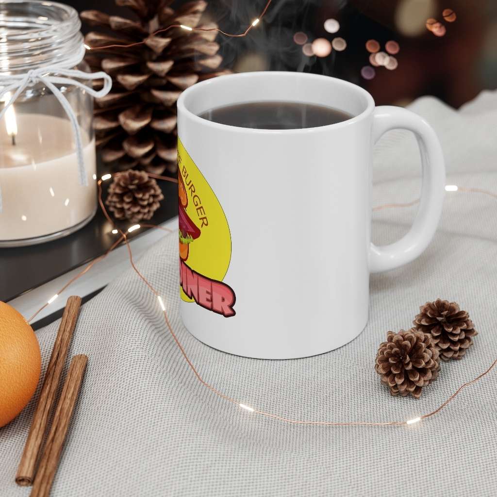 Muff’s Diner: Home of the Muff Burger Ceramic Mug 11oz | FunnyDesigns.com
